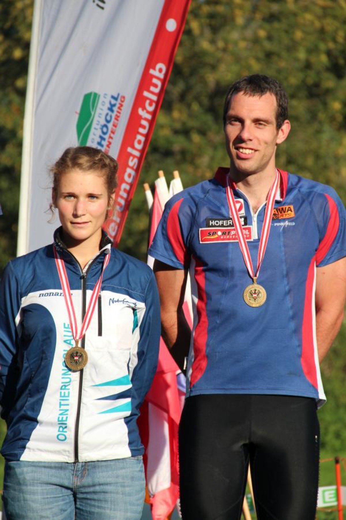 Markus Lang, Hannah Kalcher und Richard Gremmel am Podest - Oberwart